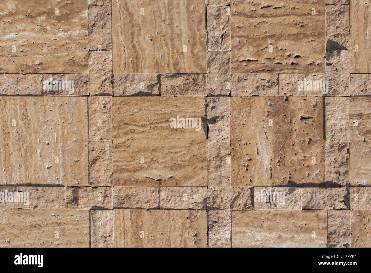 Decorative cubic stone wall as background texture Stock Photo - Alamy
