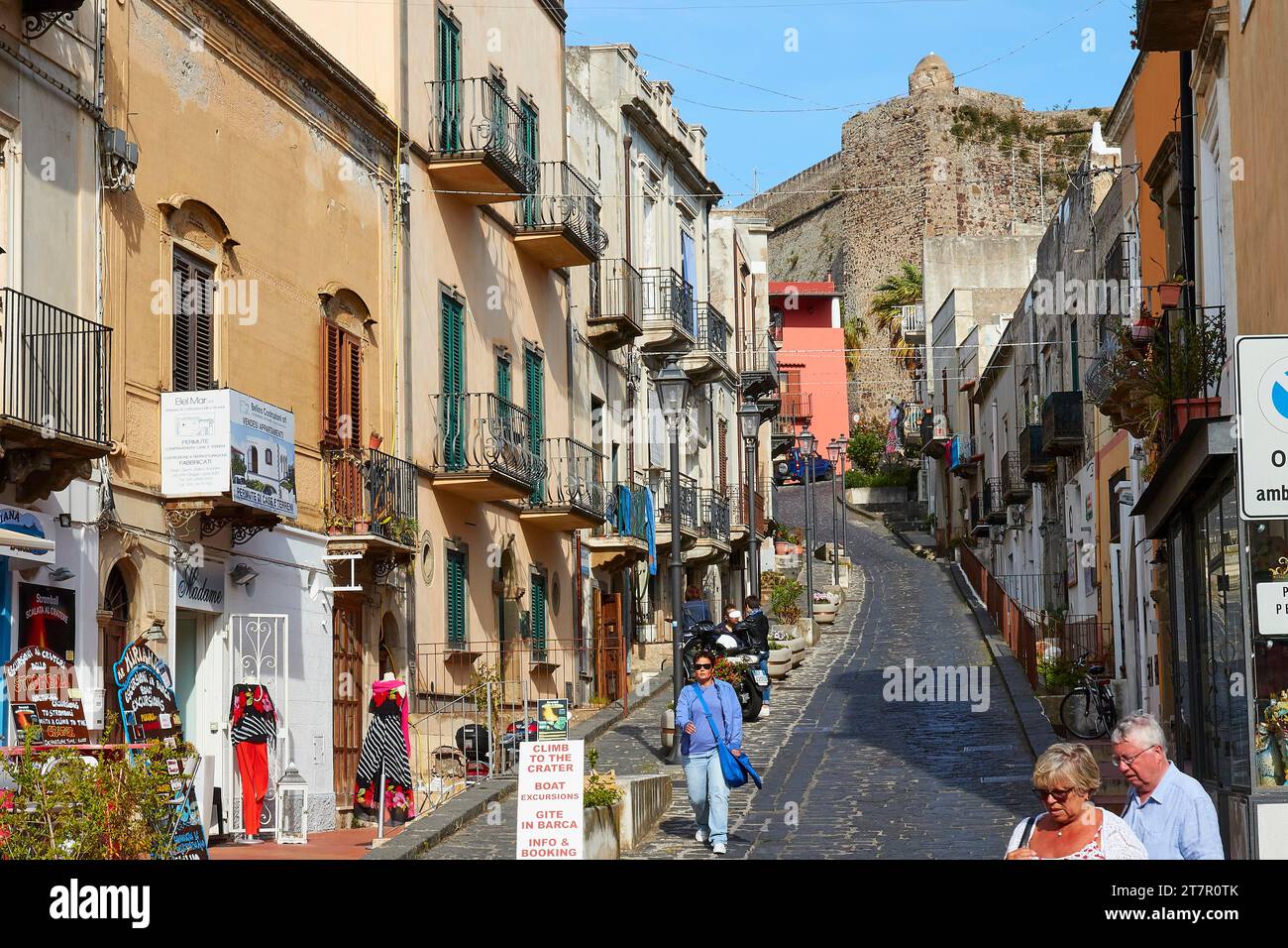 Narrow cobbled street, old town, balconies, passers-by, castle, Lipari ...
