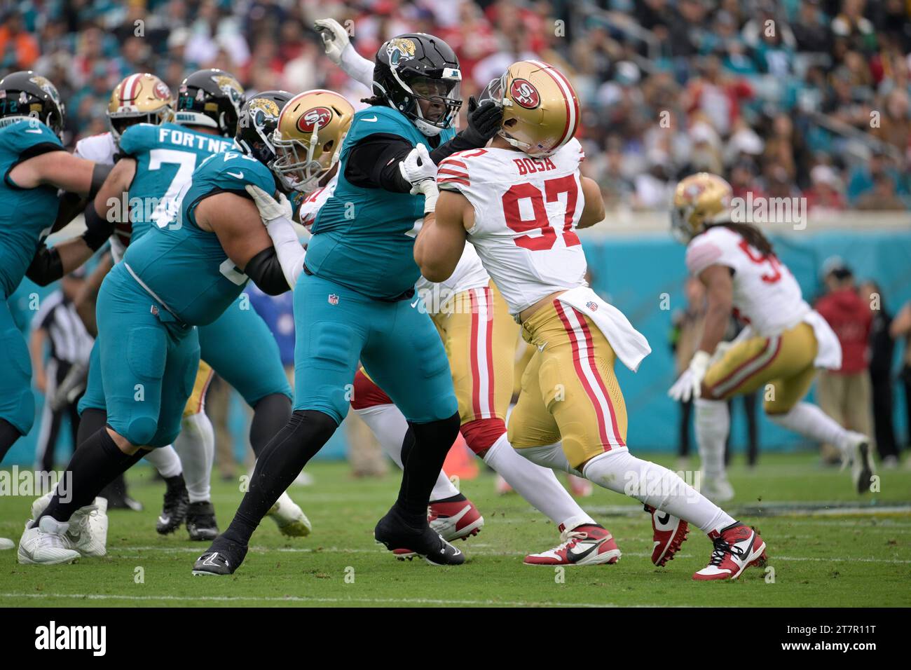 Jacksonville Jaguars offensive tackle Anton Harrison (77) works against ...