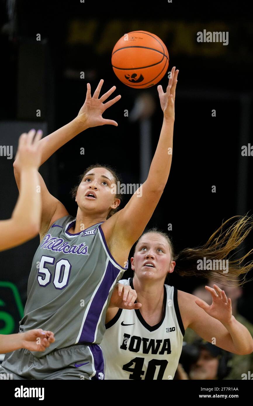 Kansas State center Ayoka Lee (50) grabs a rebound over Iowa center ...