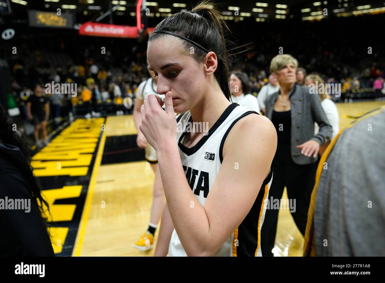 Iowa guard Caitlin Clark walks off the court after an NCAA college ...