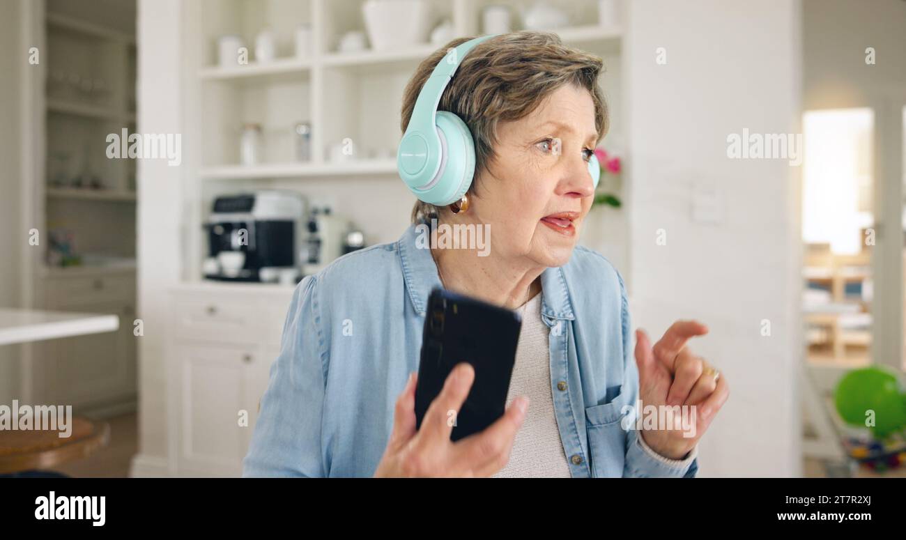 Old woman listening radio hi-res stock photography and images - Alamy