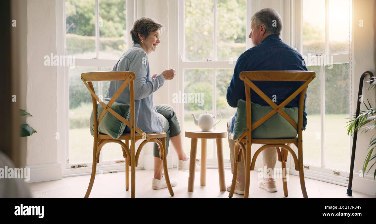 Back, coffee or old couple talking in home bonding to enjoy a ...