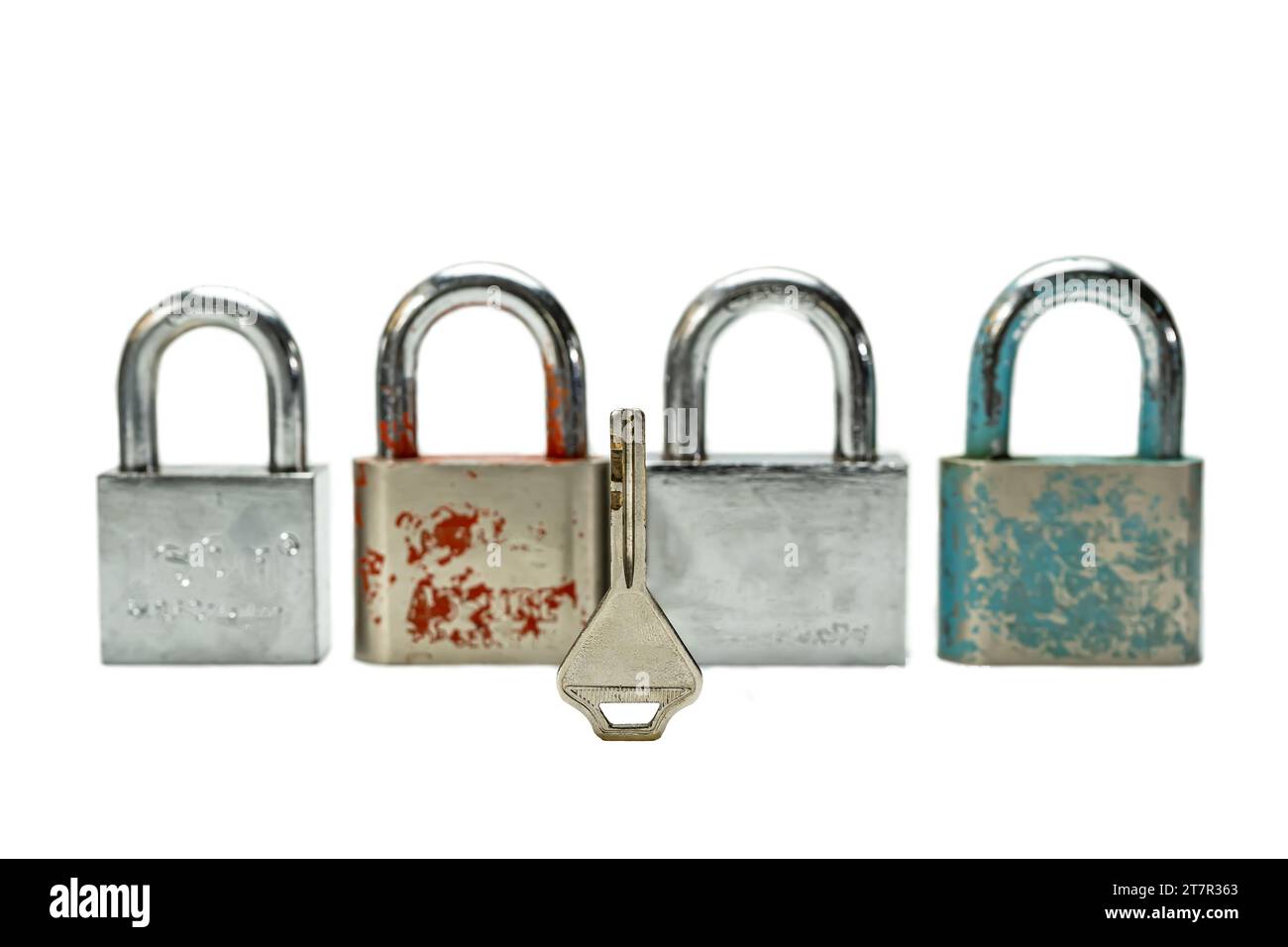 4 padlocks and 1 key isolated on a white background Stock Photo - Alamy