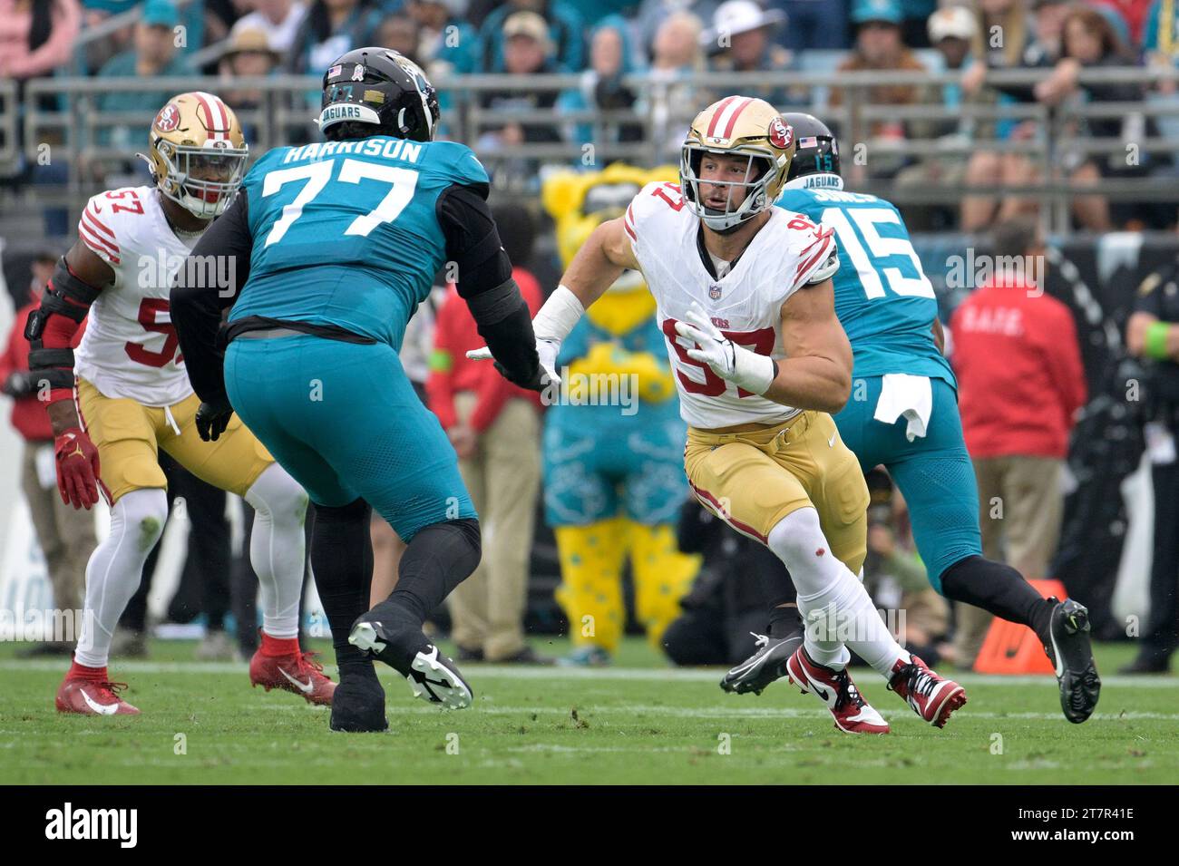 Jacksonville Jaguars offensive tackle Anton Harrison (77) works against ...