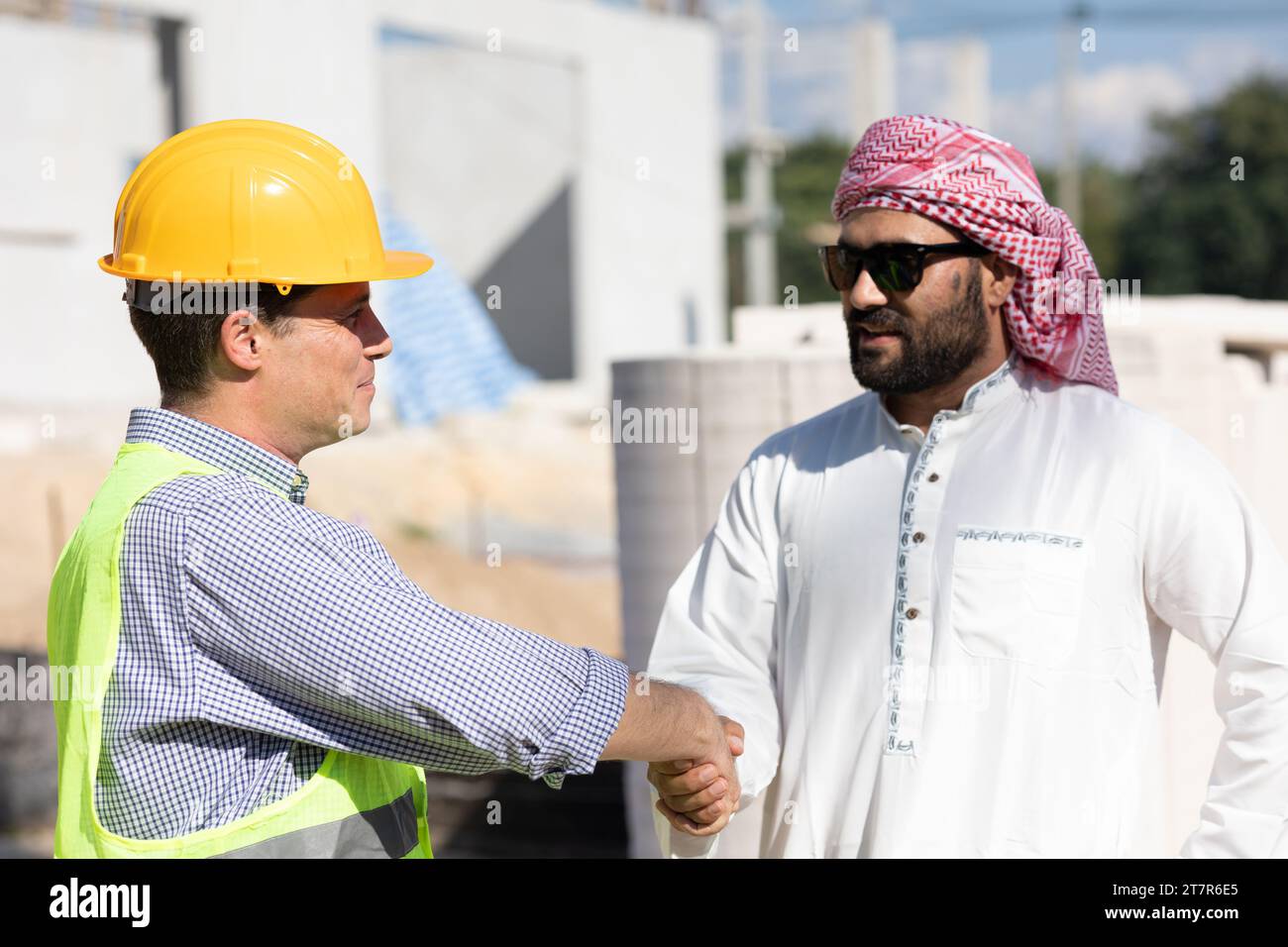 Arab business man handshake with american engineer builder construction ...