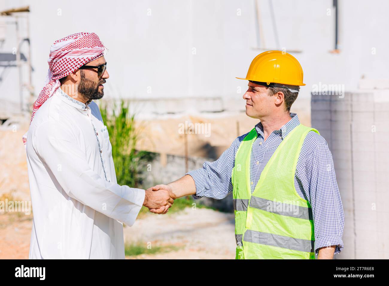 Arab business man handshake with american engineer builder construction ...