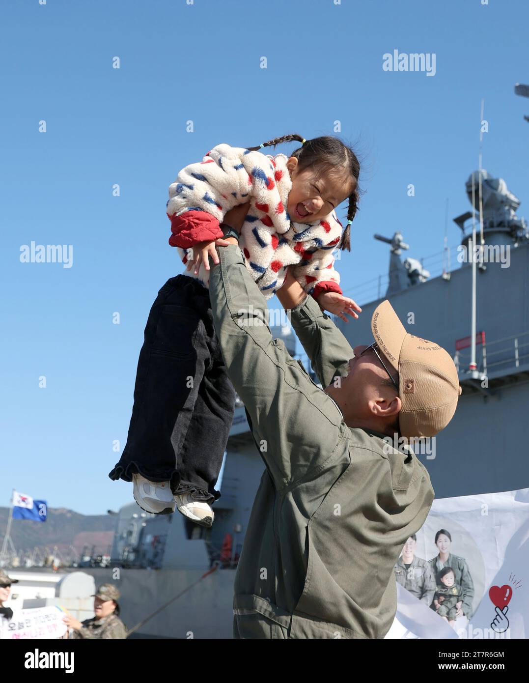 17th Nov, 2023. Return from Hormuz A naval officer lifts his daughter ...