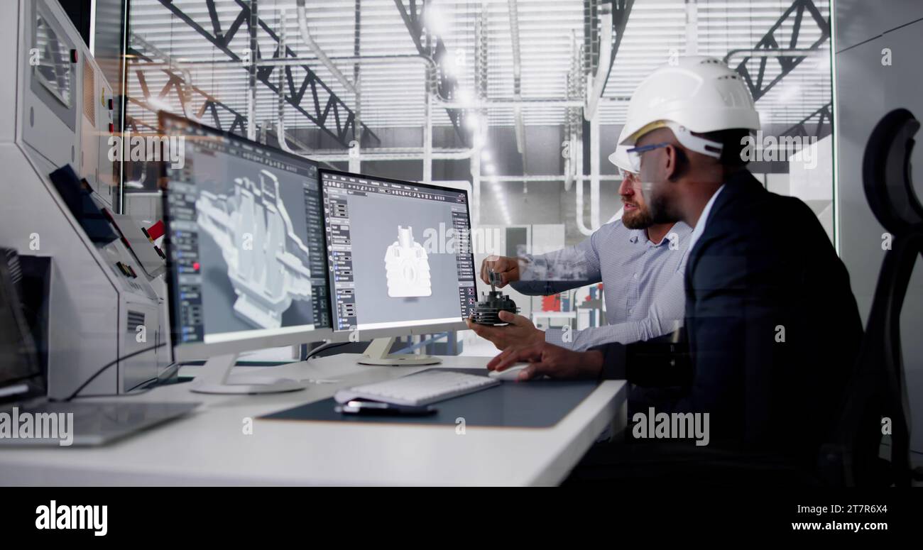 Engineer Doing 3D CAD Model Design On Computer At Factory Stock Photo ...
