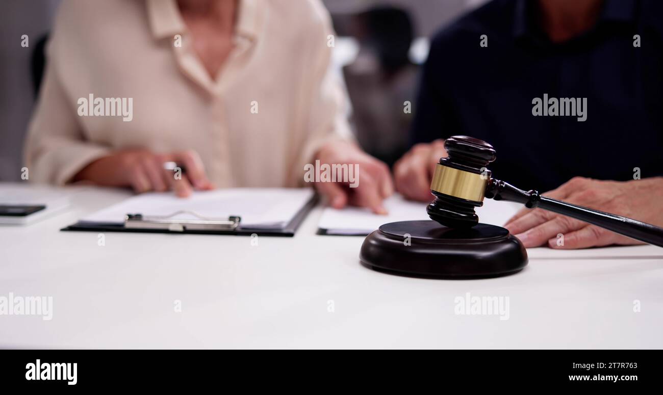 Lawyer reviewing legal document contract for thorough review Stock ...