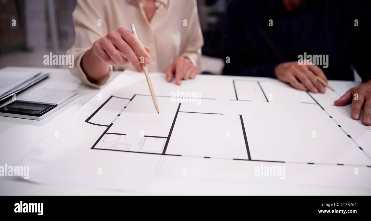 Real Estate Stager: A Designer's Working with Computer Stock Photo - Alamy