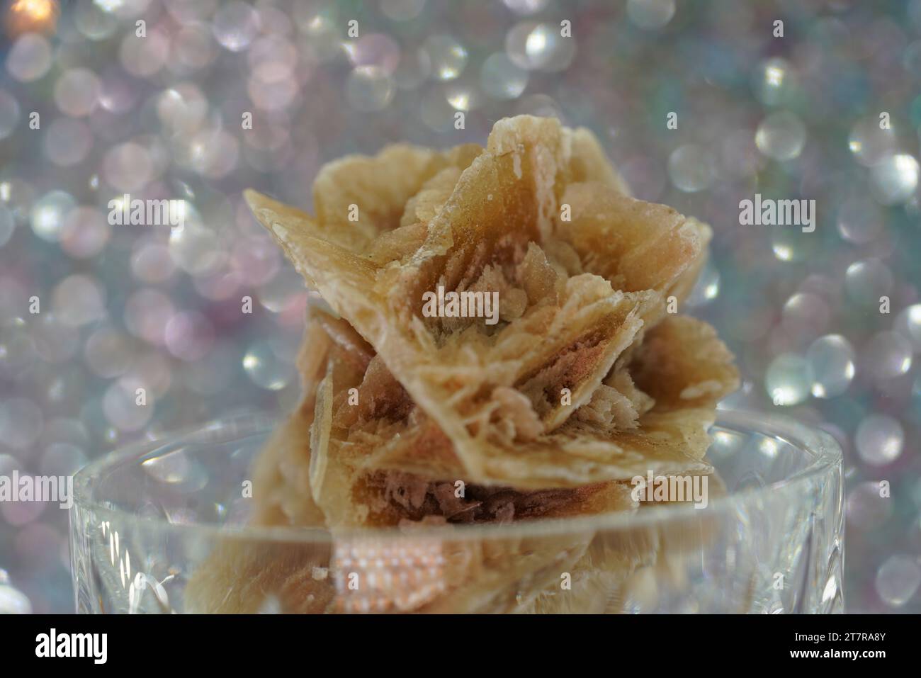 Gypsum rose with a crystal on a cut out background, Crystals resembling ...