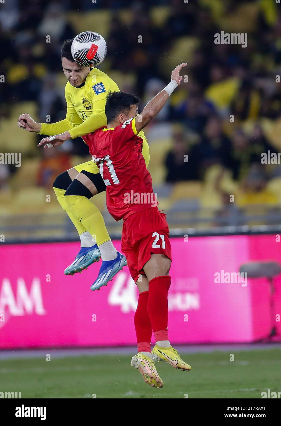 Kuala Lumpur, Malaysia. 16th Nov, 2023. Dion Cools of Malaysia (L) and Musabekov Farkhat of ...