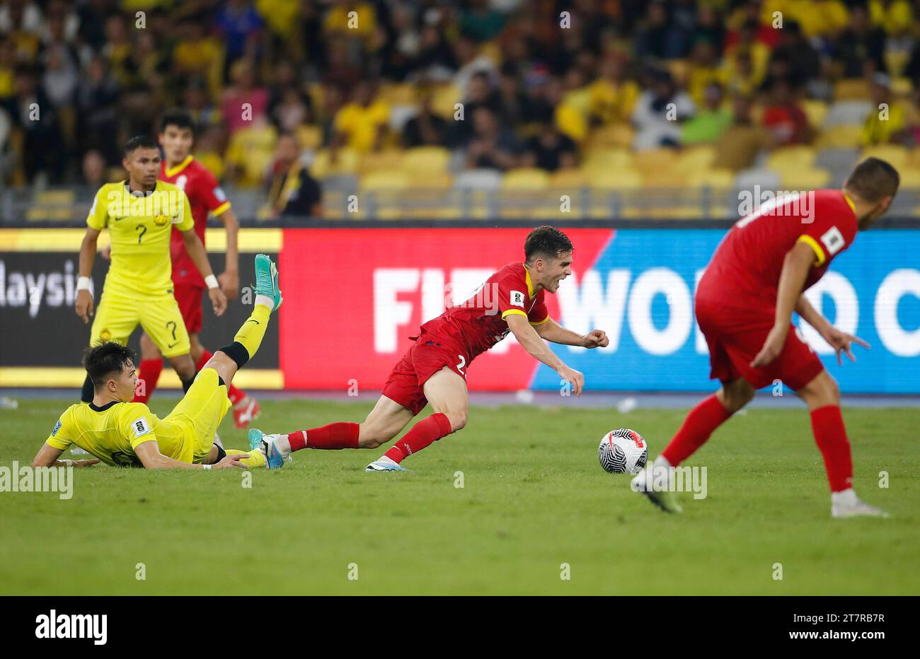 Kuala Lumpur, Malaysia. 16th Nov, 2023. Dion Cools of Malaysia (L) and Shukurov Alimardon of ...