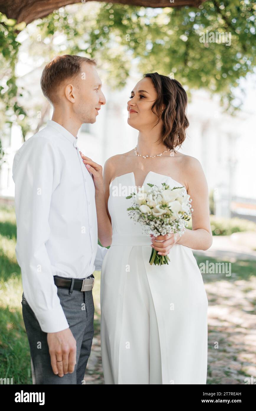 Happy bride and groom after wedding ceremony Stock Photo - Alamy