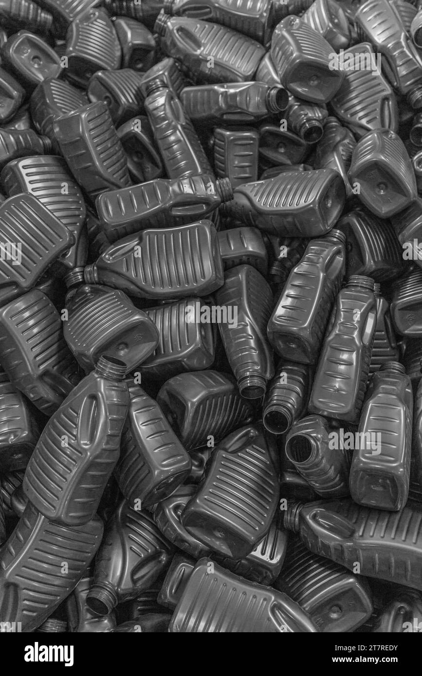 one color and form new engine oil gallon on the stand Stock Photo - Alamy