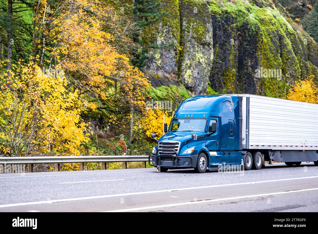 Long hauler carrier big rig blue semi truck with extended cab ...