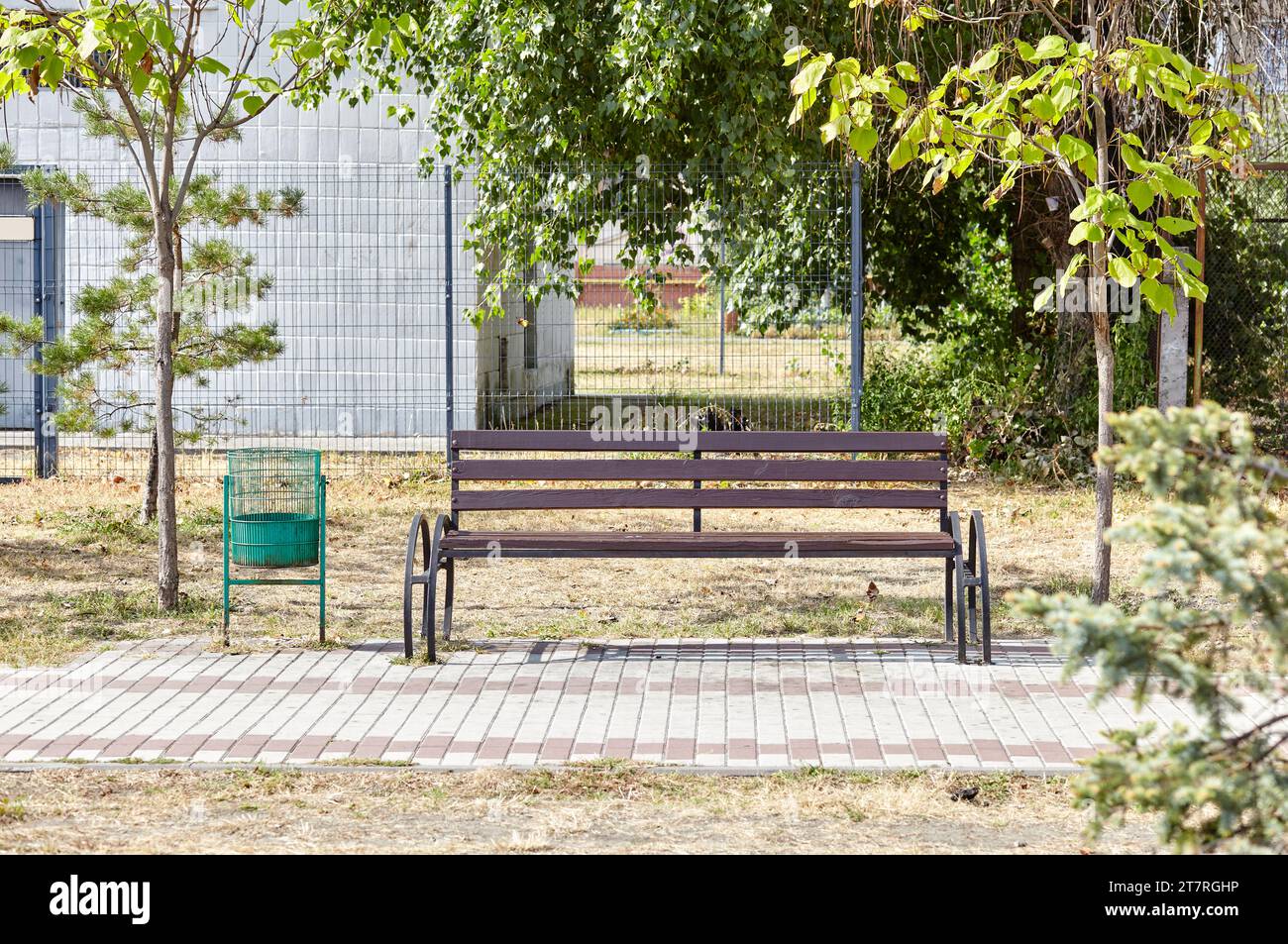 Rest area with bench. Place to rest in the city park Stock Photo - Alamy
