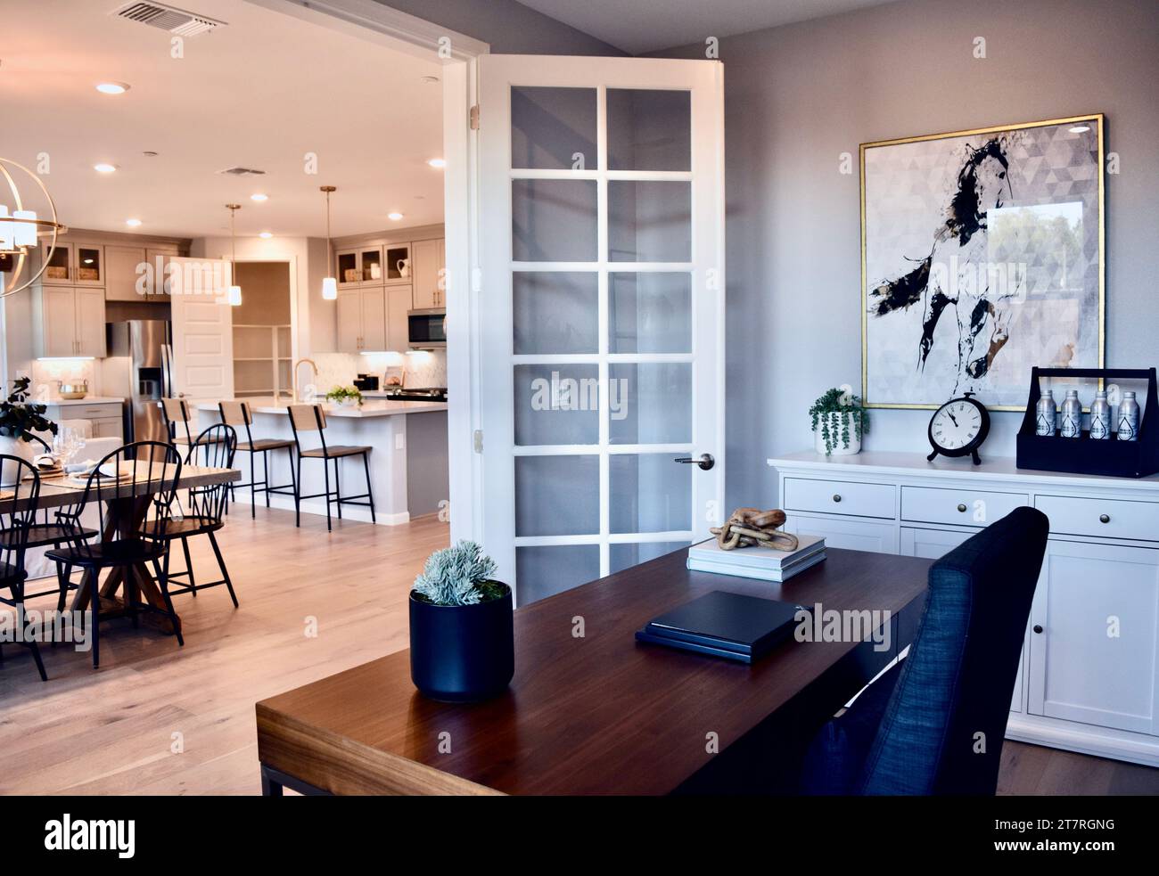An inviting dining table set in a modern kitchen Stock Photo - Alamy