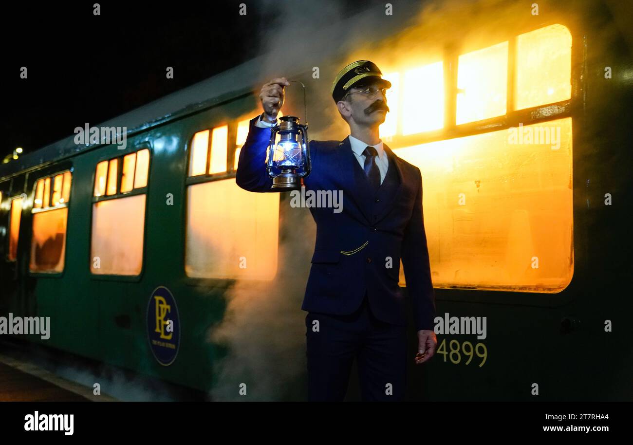 An actor playing the role of the Conductor, poses for a photograph ...