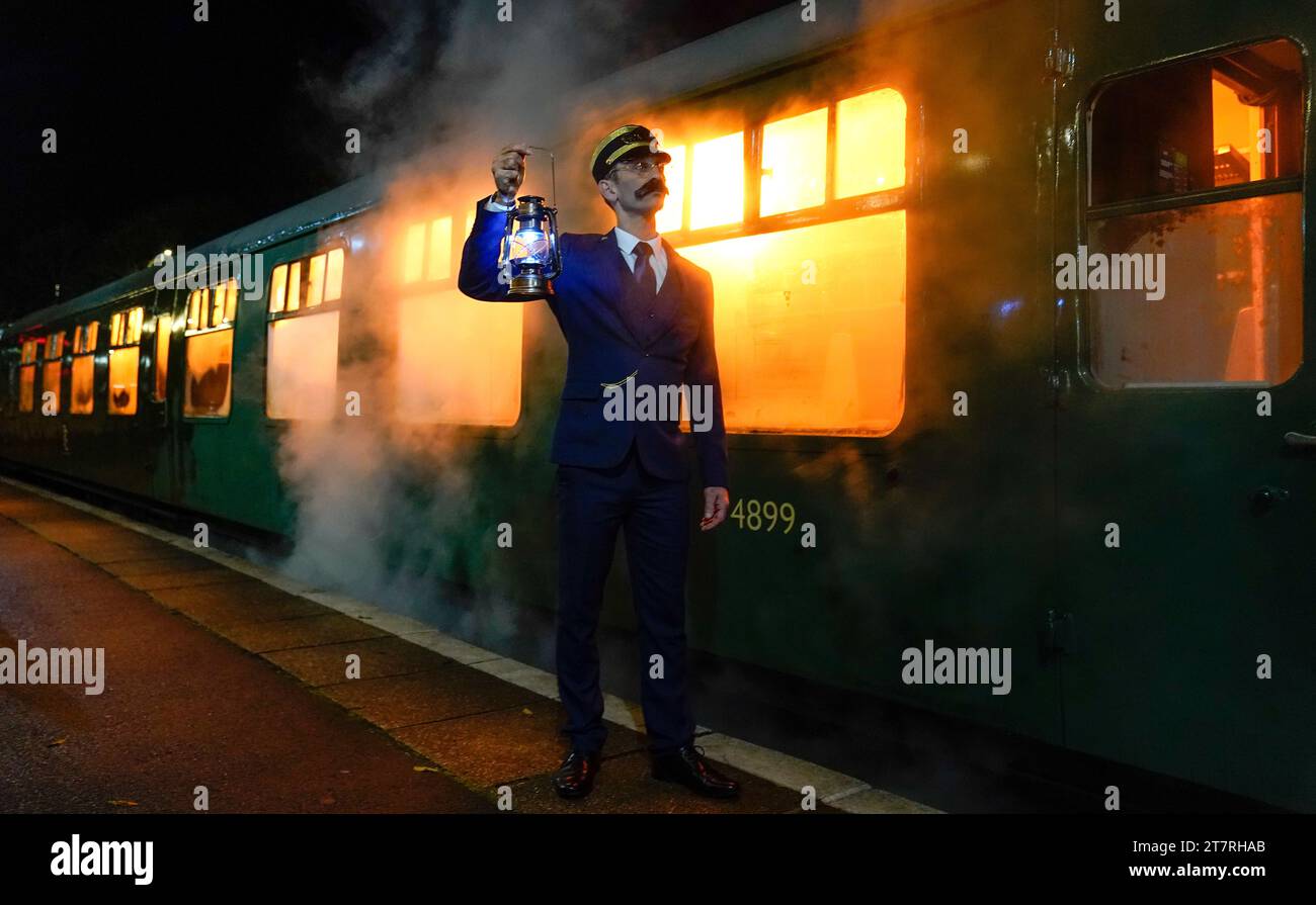 An actor playing the role of the Conductor, poses for a photograph ...
