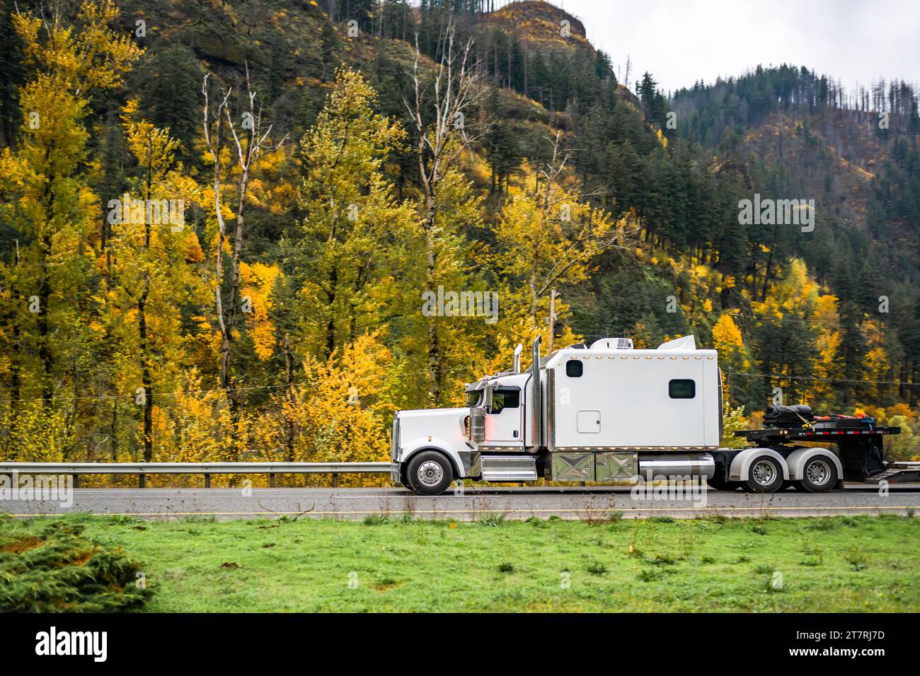 White classic long hauler carrier big rig semi truck with extended cab ...