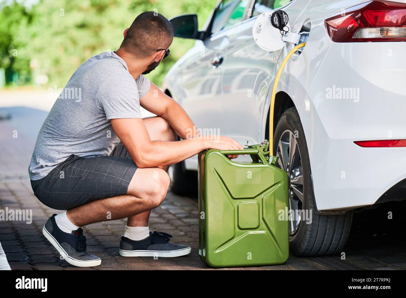 Stealing fuel hi-res stock photography and images - Alamy