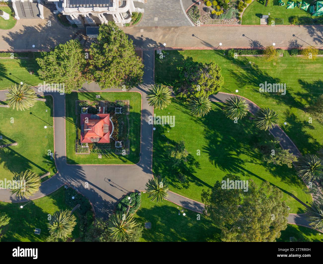 Aerial view of a rotunda in a green park with structured walkways at ...
