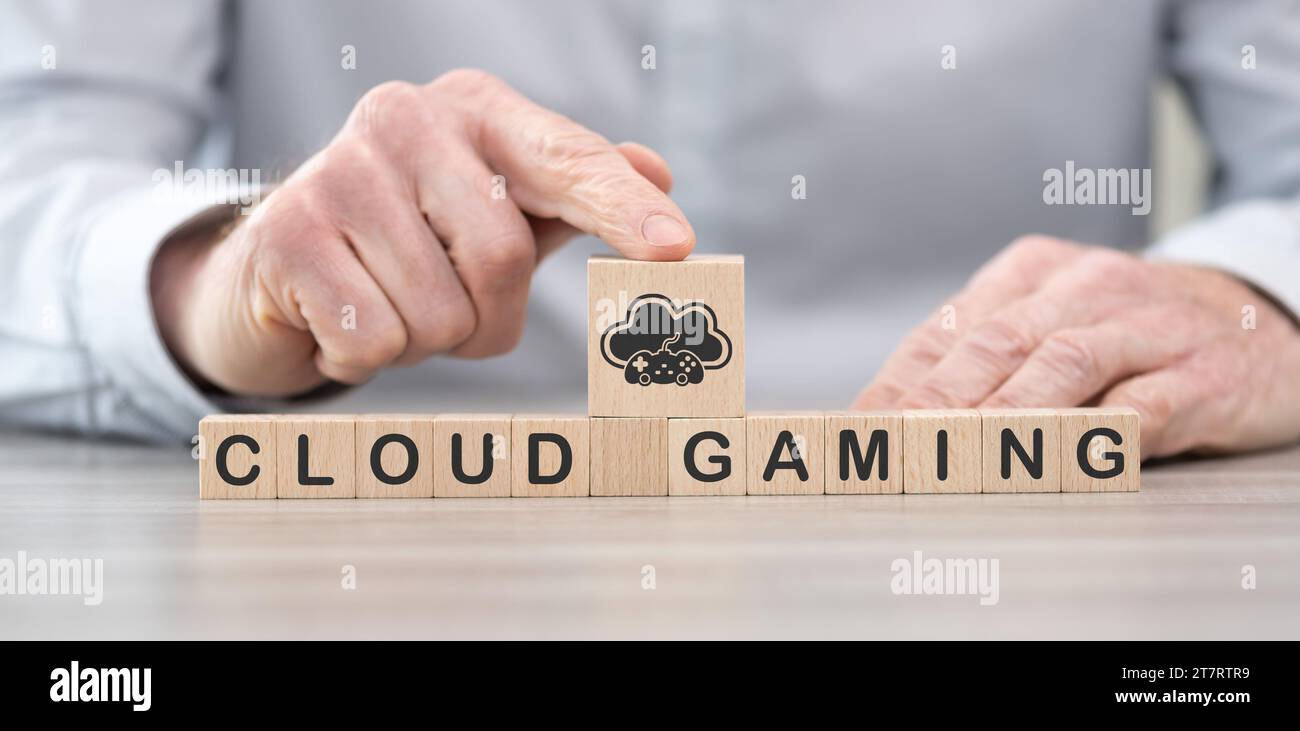Wooden blocks with symbol of cloud gaming concept Stock Photo - Alamy