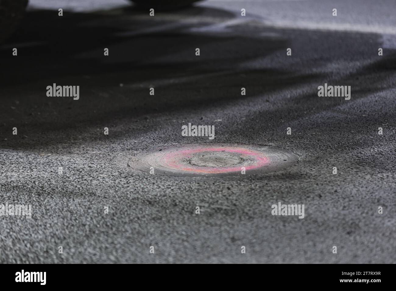 Works on the circuit surface after damages caused by a manhole cover ...