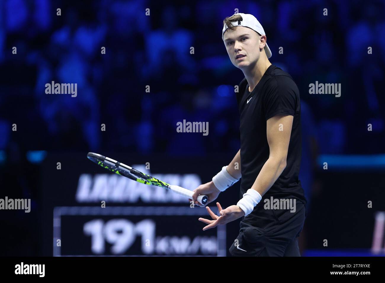 Holger Rune of Denmark looks dejected during the Round Robin singles match between Jannik Sinner ...