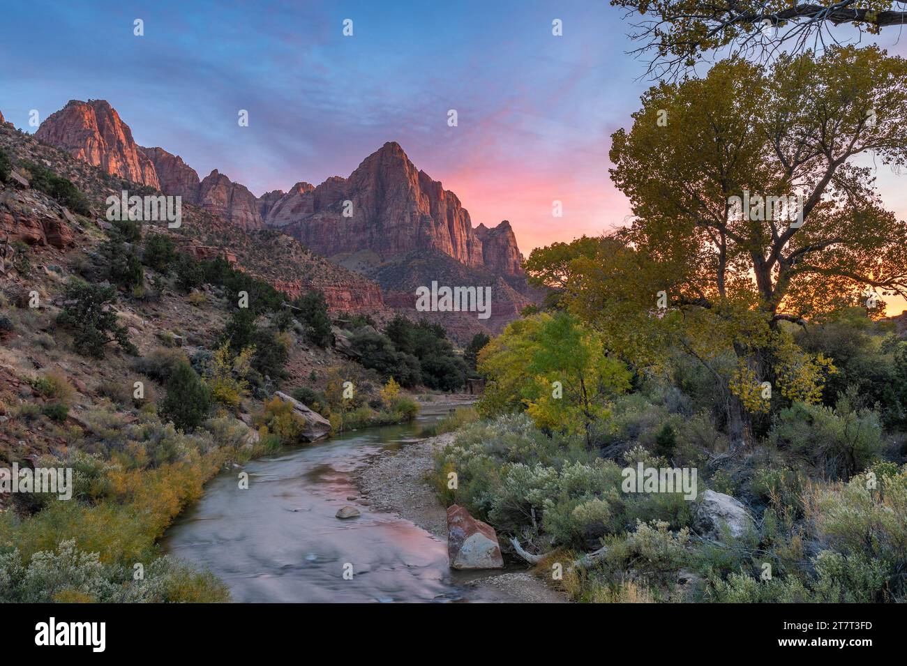 Sun sets behind The Watchman on the Pa'rus Trail, Virgin River, from a ...
