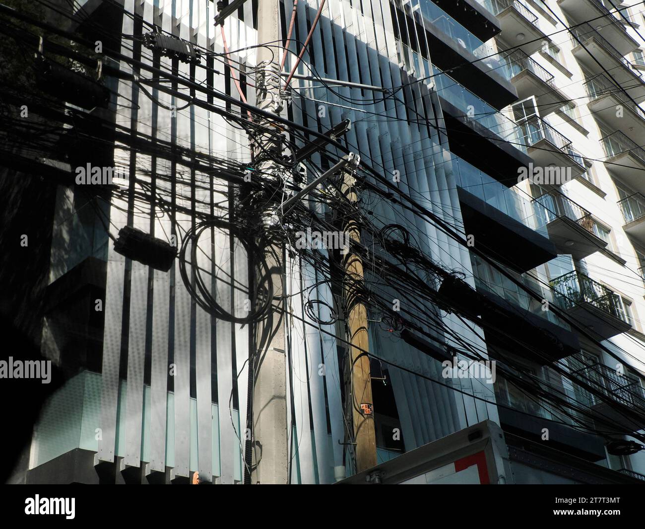 Mexico City, Messed up power lines and connection cables. Many tangled ...
