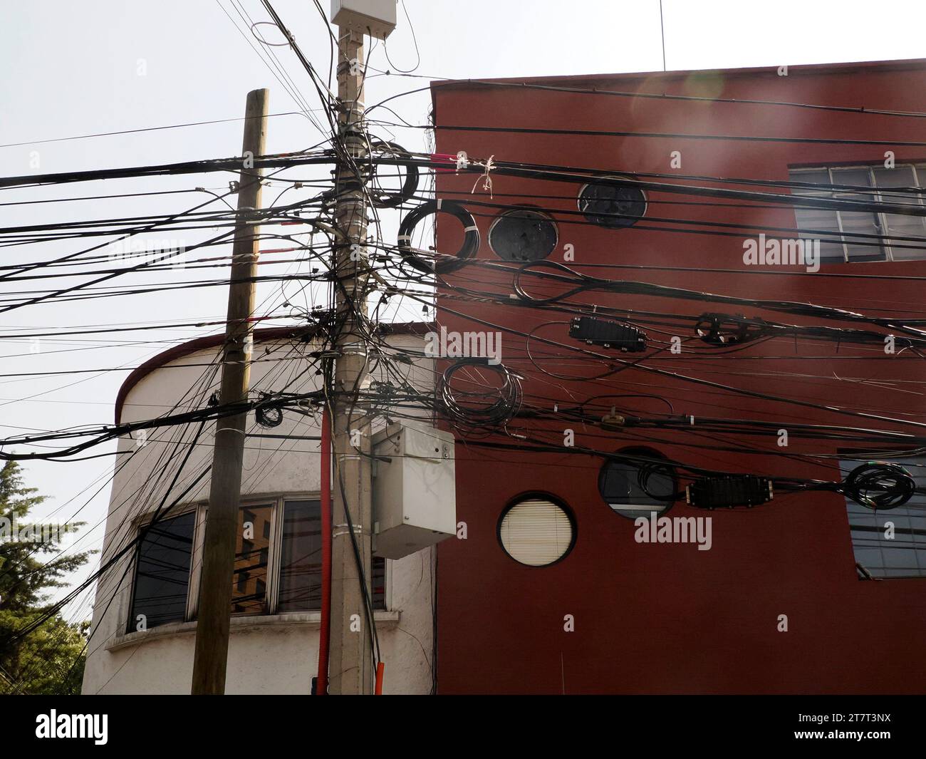 Mexico City, Messed up power lines and connection cables. Many tangled ...