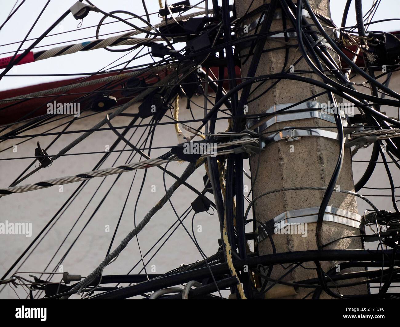 Mexico City, Messed up power lines and connection cables. Many tangled ...