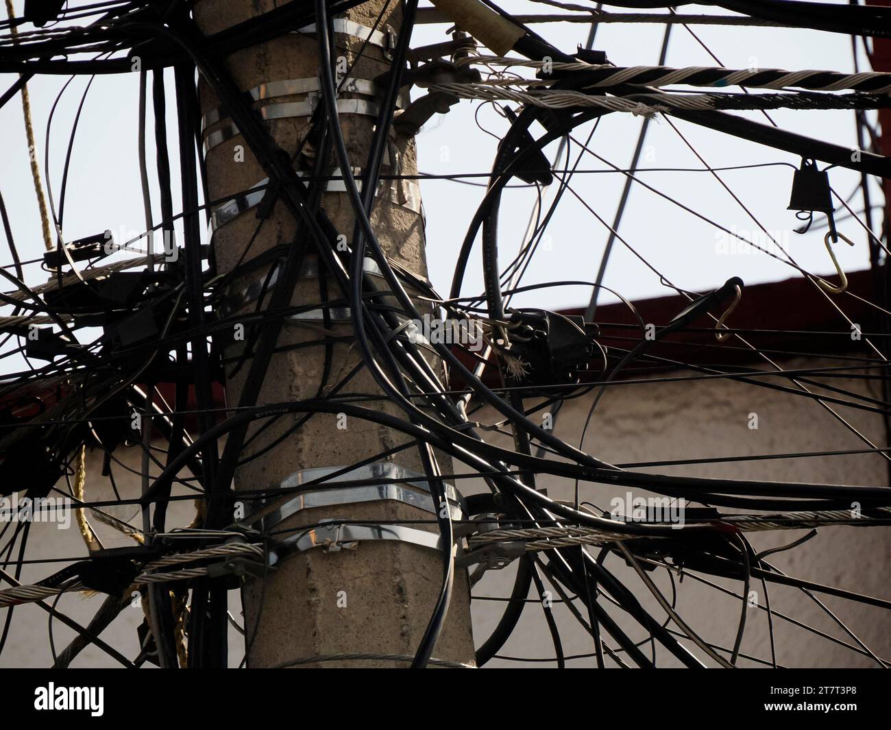 Mexico City, Messed up power lines and connection cables. Many tangled ...