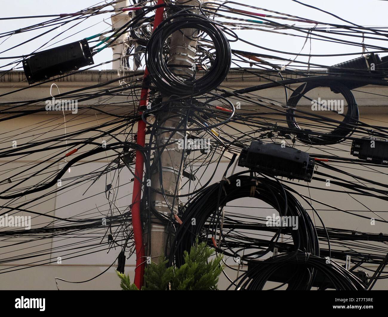 Mexico City, Messed up power lines and connection cables. Many tangled ...
