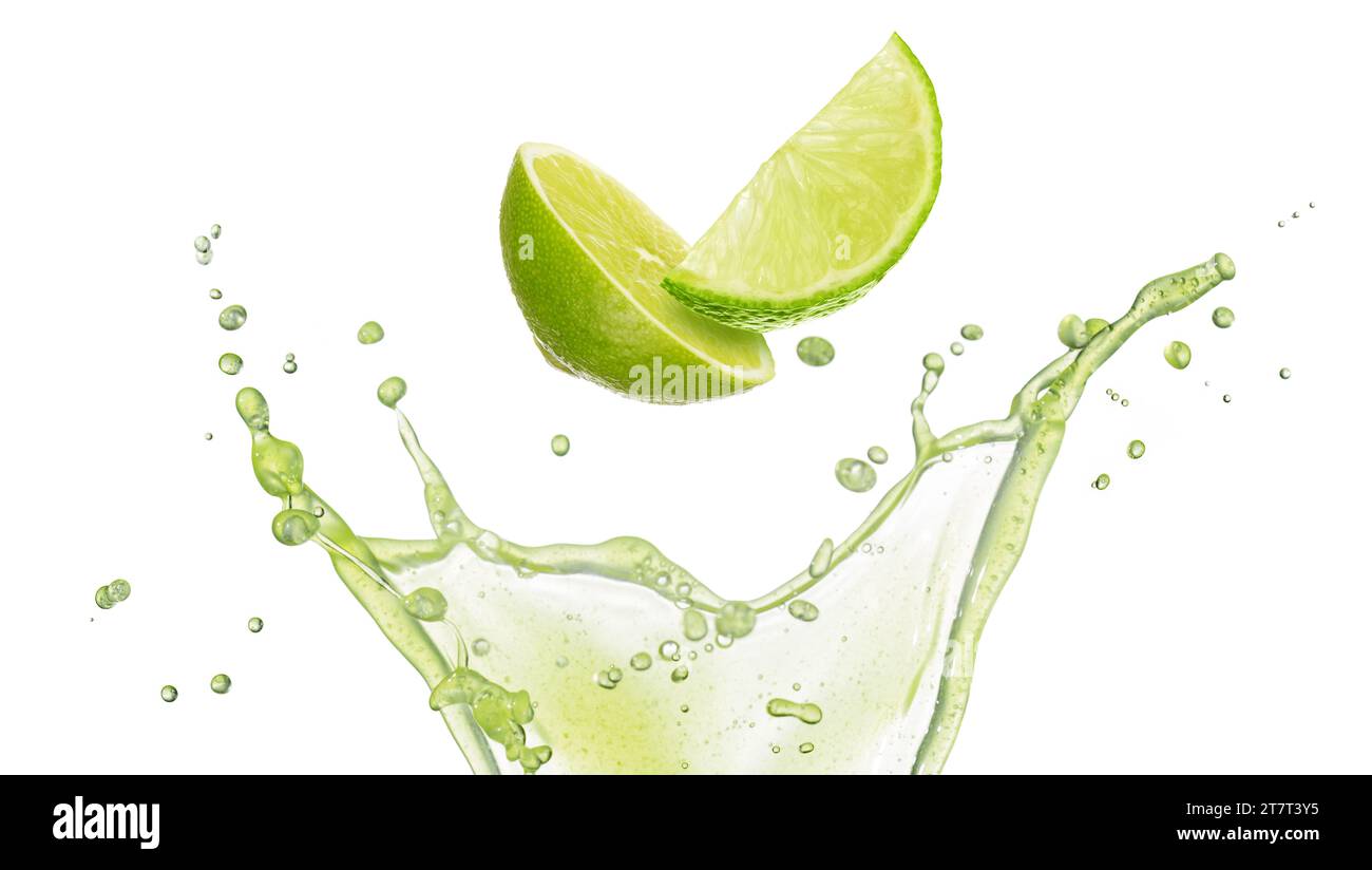 Two lime slices falling into a green juice splash isolated on white background Stock Photo - Alamy