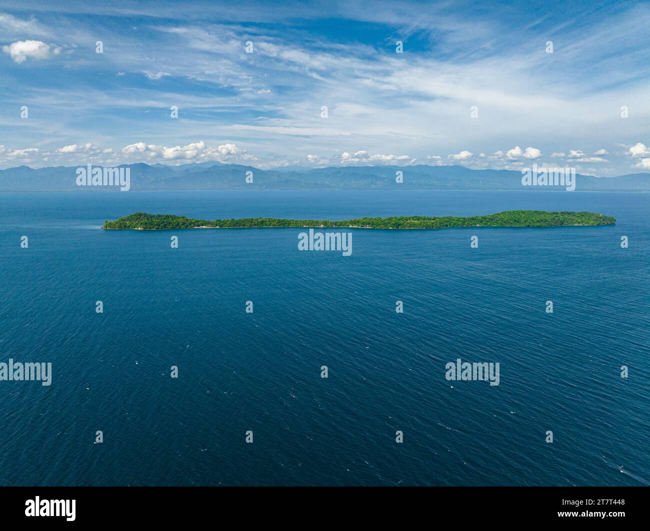 Drone view of small island, blue sea, blue sky and clouds. Samal Island ...