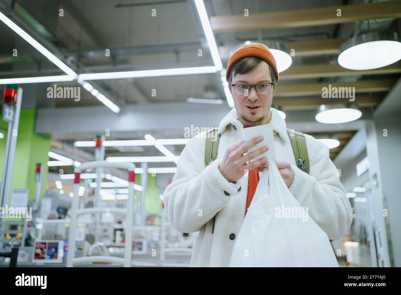 Paper bag with product and cash receipt hi-res stock photography and ...