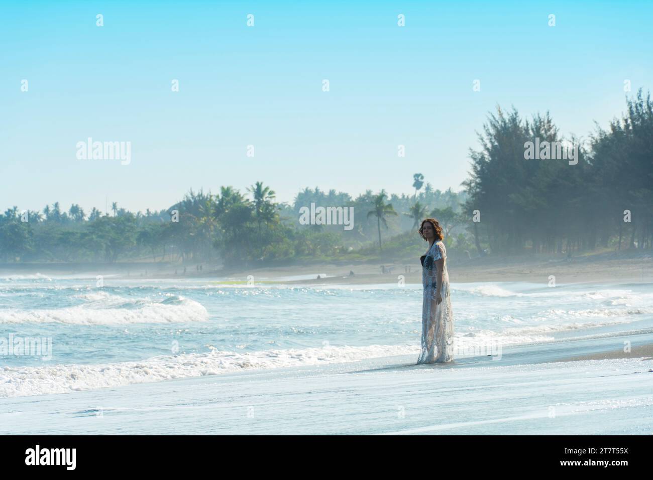 Boho model posing on a beautiful beach, Bali Stock Photo - Alamy