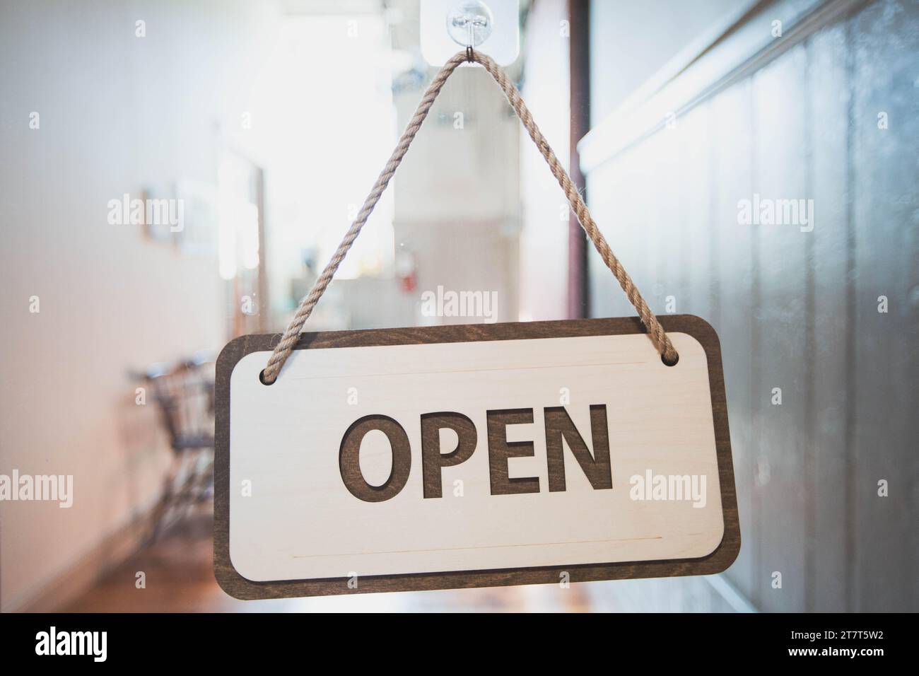 White sign hanging on hi-res stock photography and images - Alamy