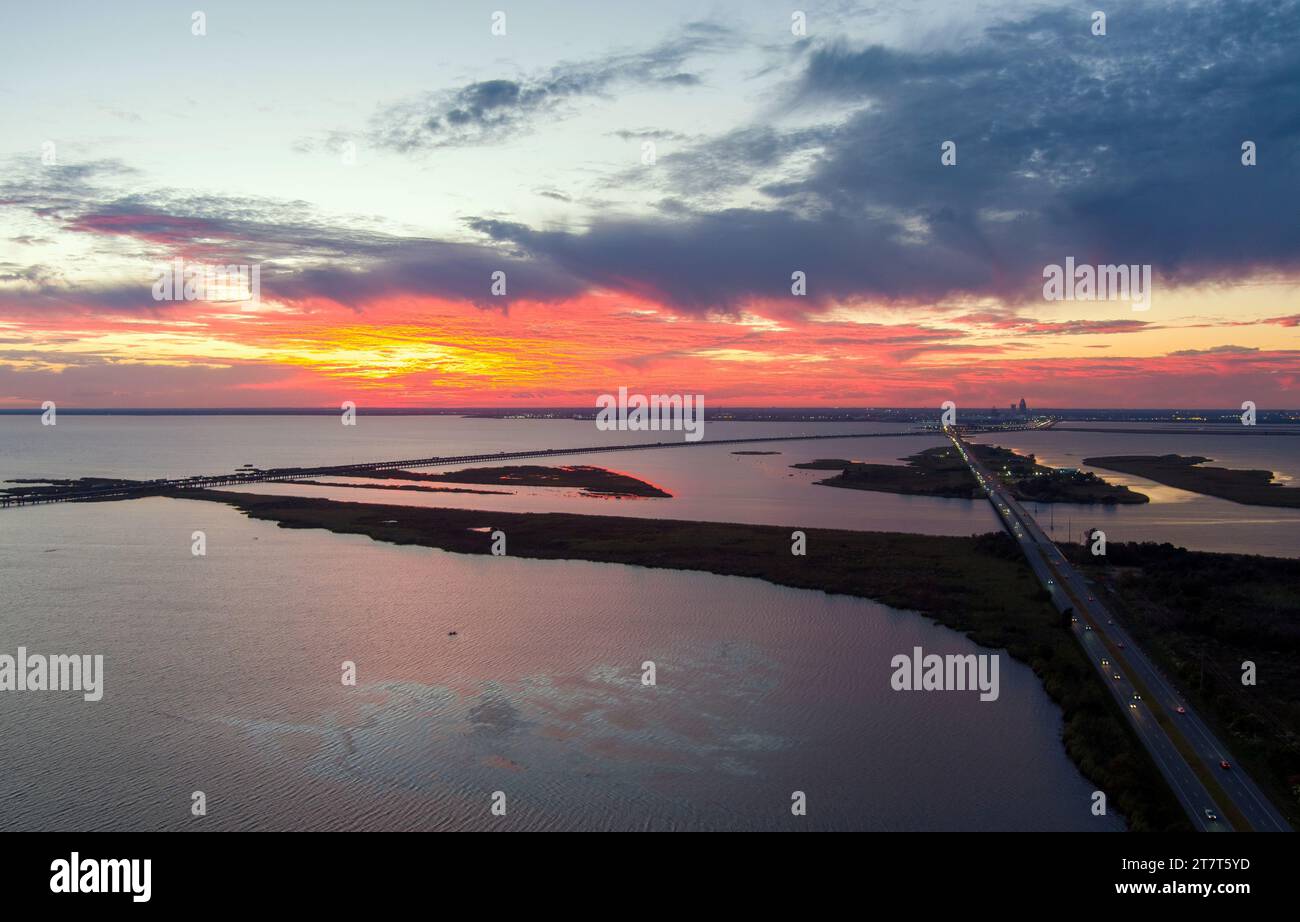 Mobile Bay causeway and the Jubilee Parkway bridge at sunset Stock ...