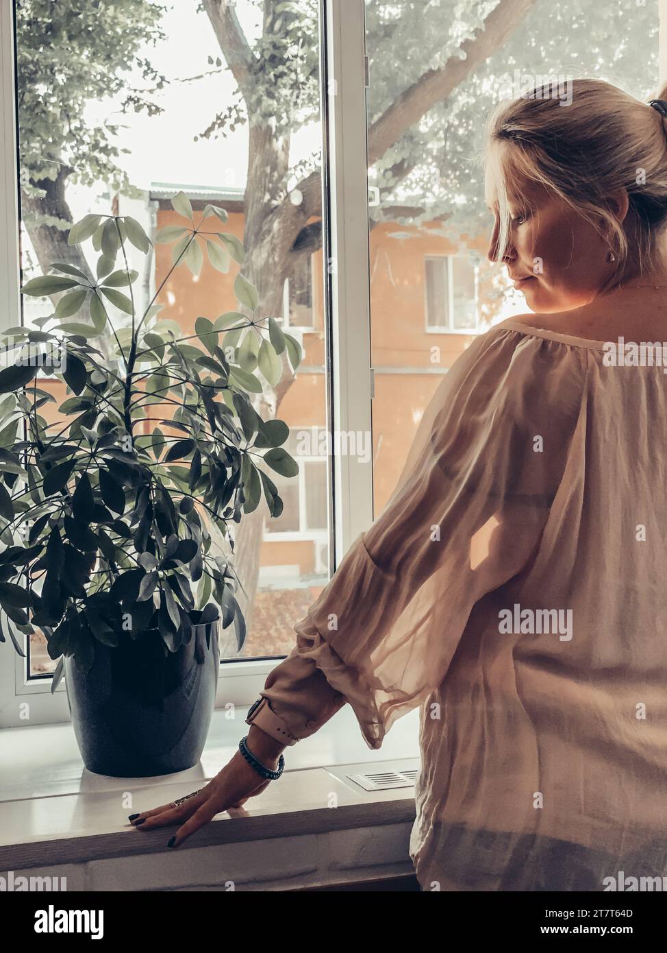 Ukraine old lady window hi-res stock photography and images - Alamy