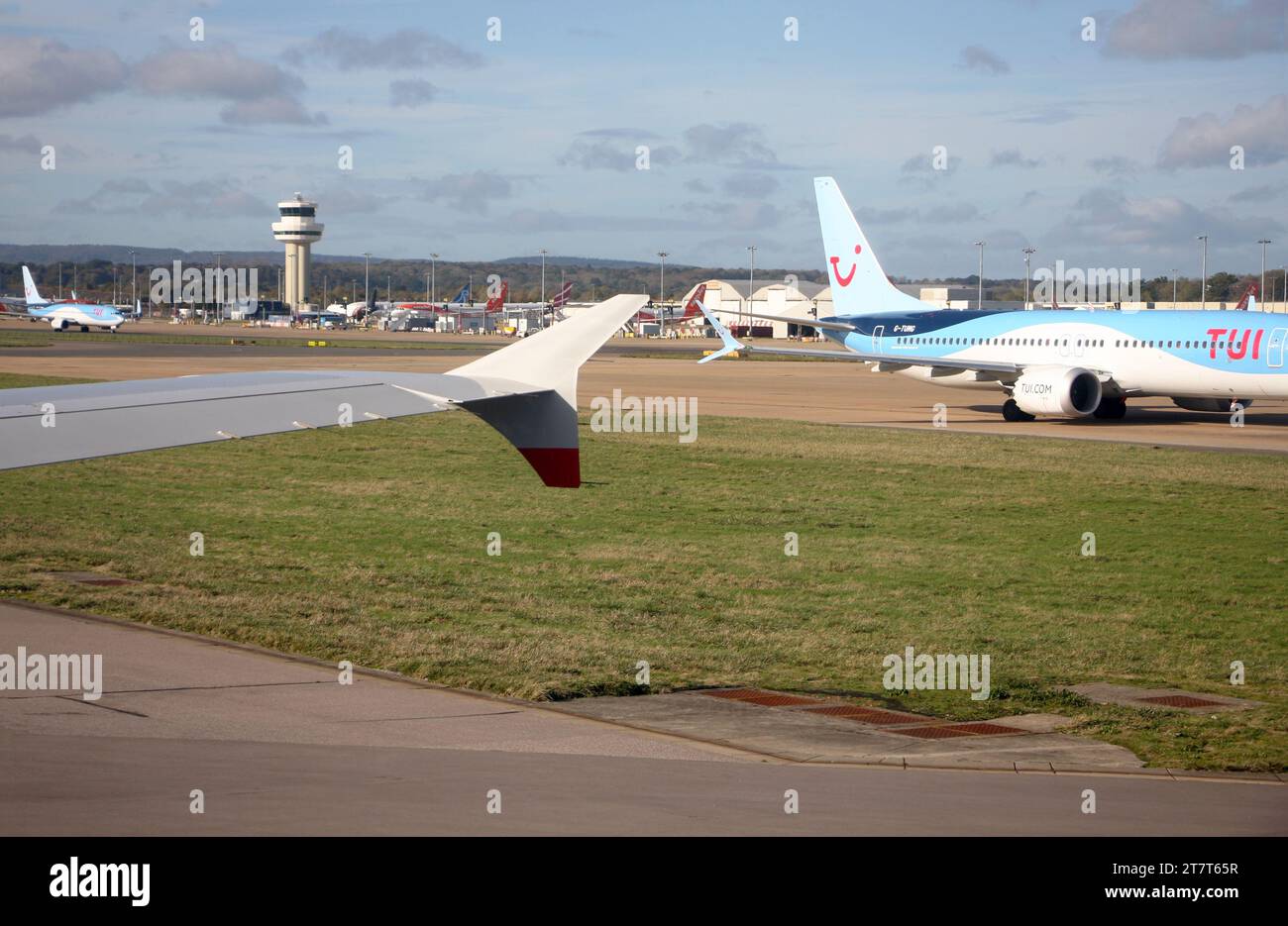 A view of London Gatwick Airports control tower with a wing view from ...
