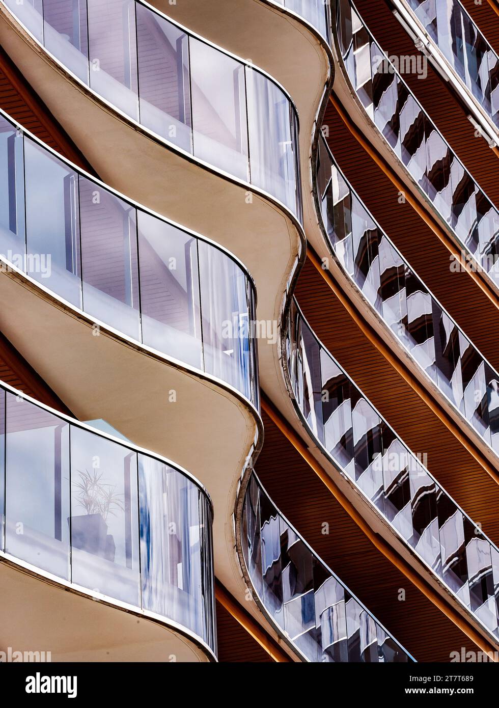 reflections on the wave-shaped balconies Stock Photo - Alamy