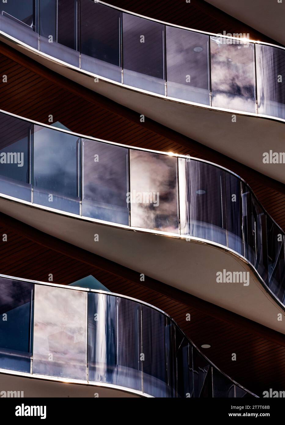 reflections on the wave-shaped balconies Stock Photo - Alamy