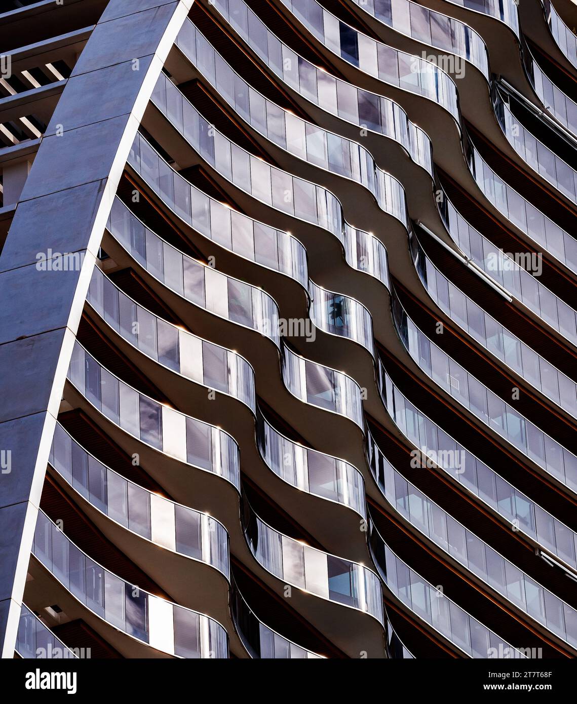 reflections on the wave-shaped balconies Stock Photo - Alamy