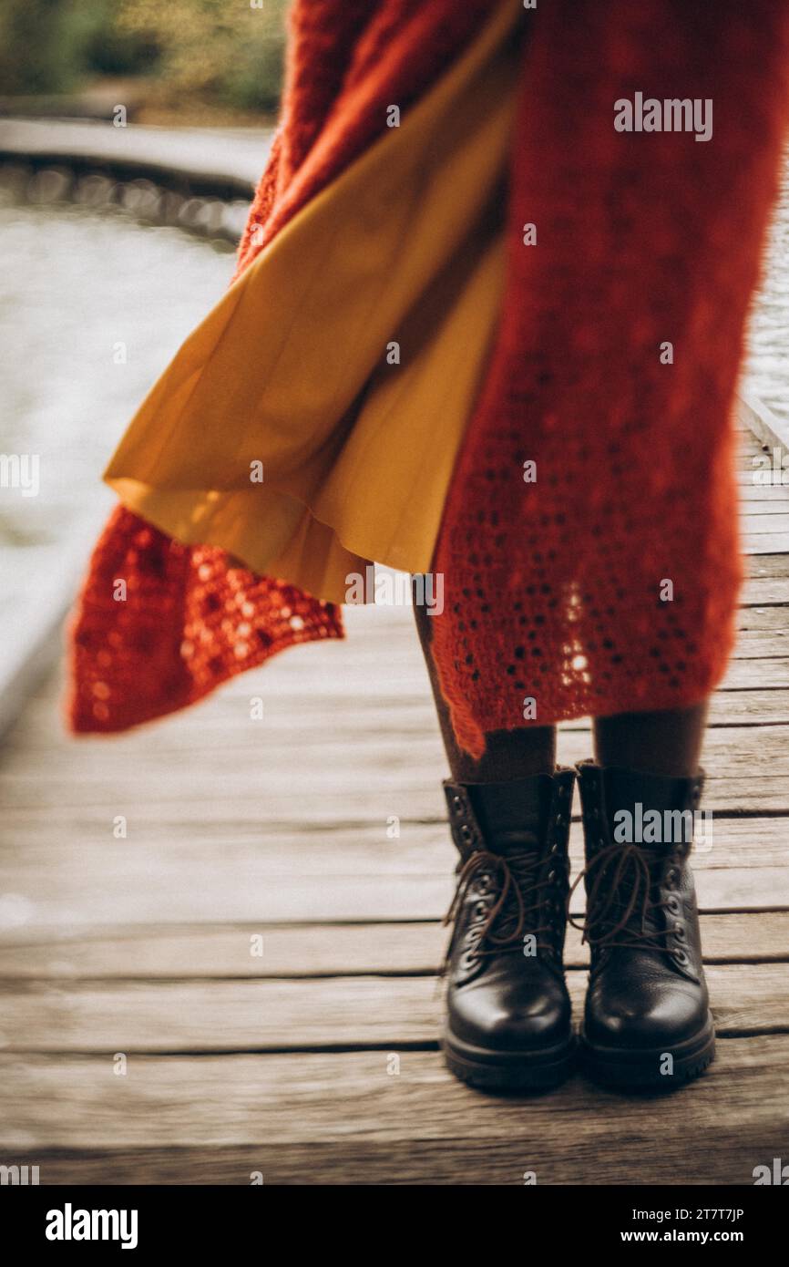 Legs and a bright skirt fluttering in the wind Stock Photo - Alamy