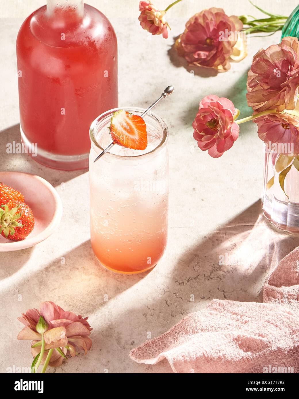 Pink Strawberry Drink with Garnish Stock Photo - Alamy